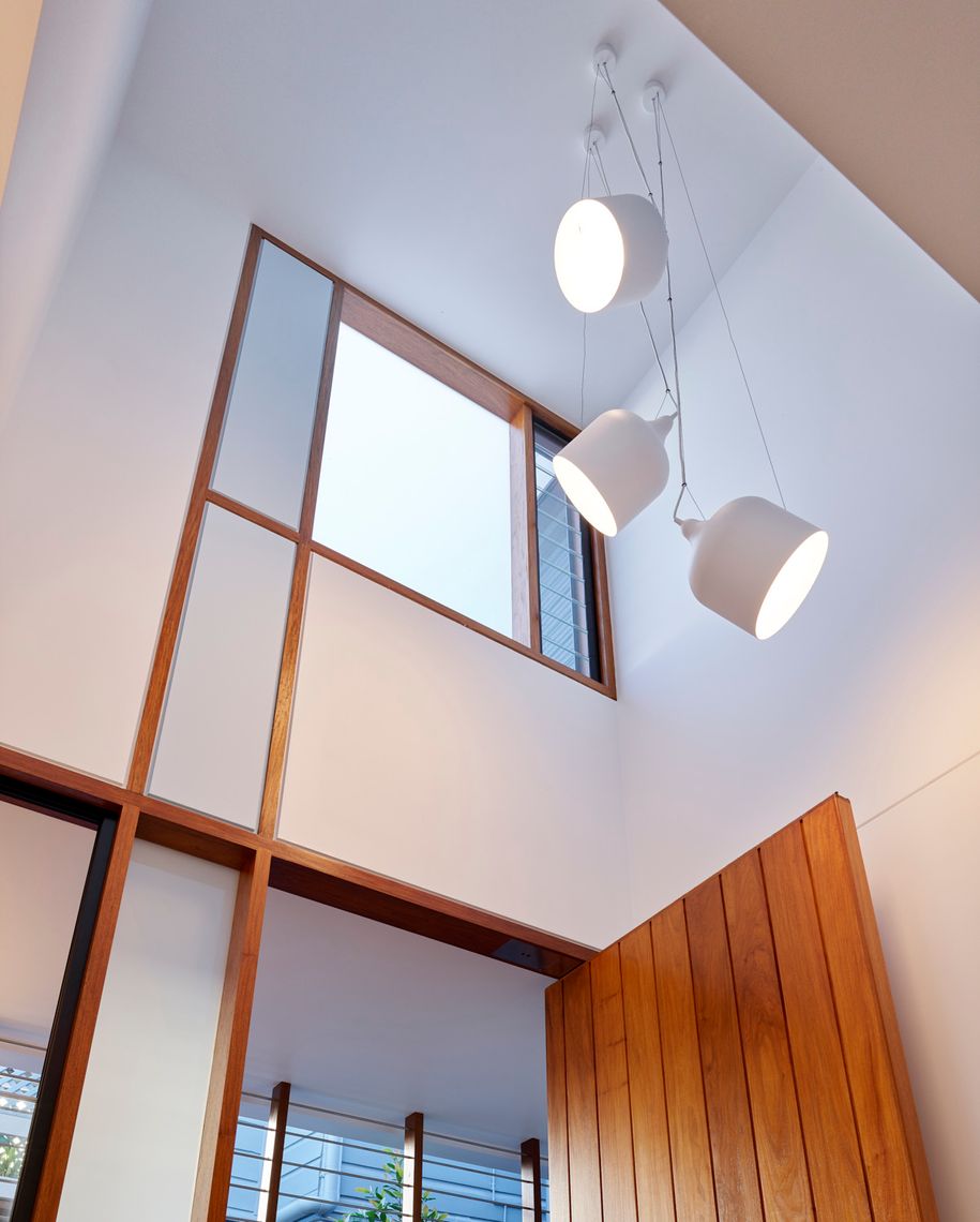 This modern Queenslander has a surprise behind its unassuming facade