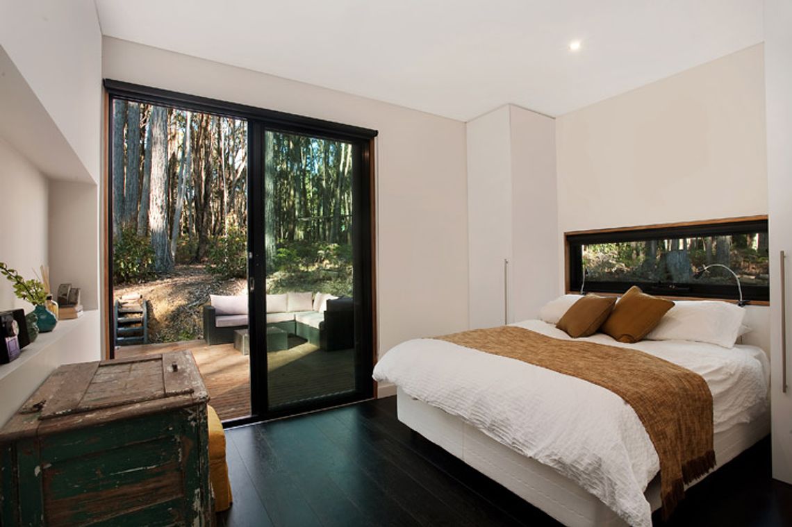 A Perfectly Proportioned Prefab Cabin Secluded in a Forest Clearing