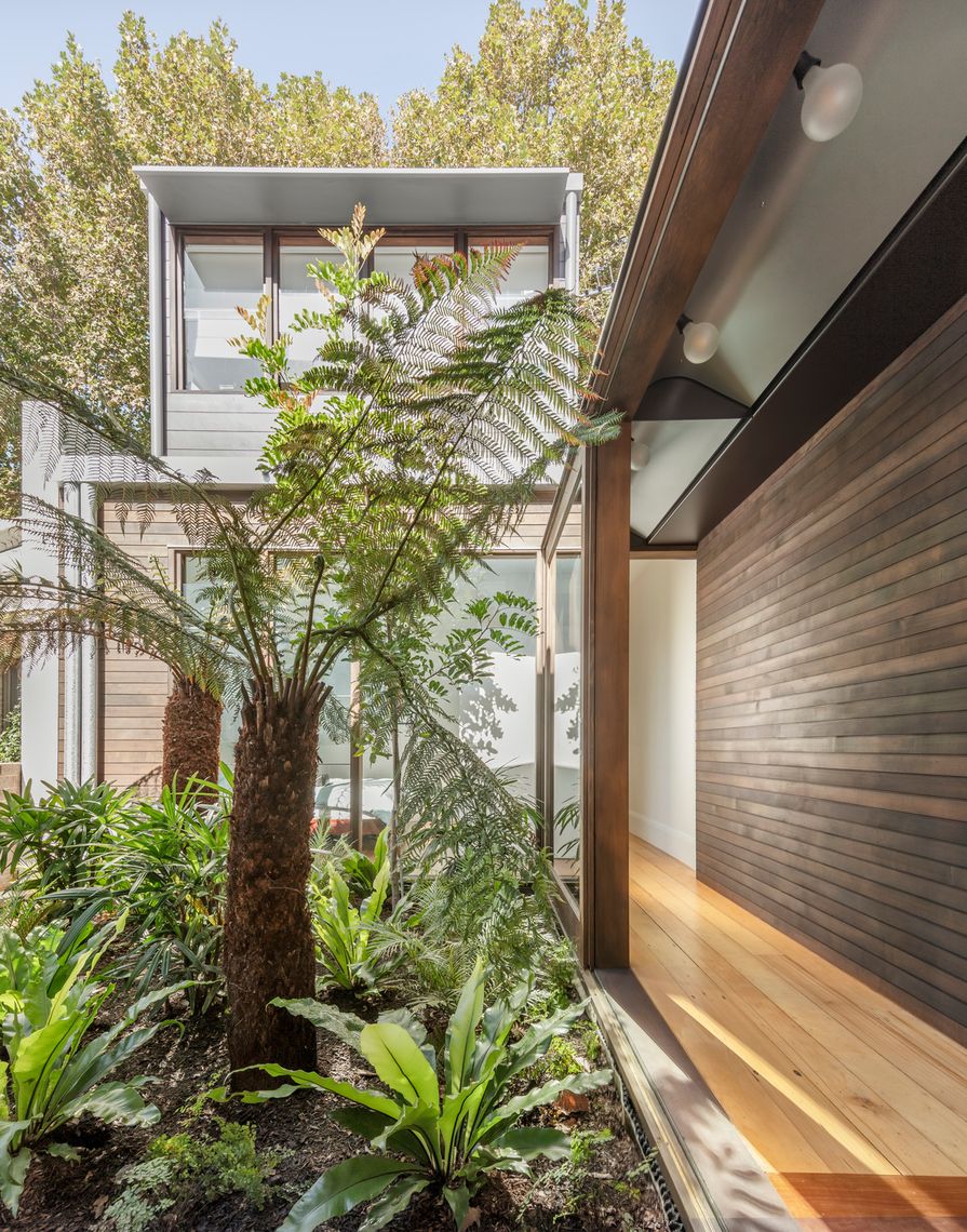 The Secret to Ensuring Light and Breezes for this Long Narrow Home...