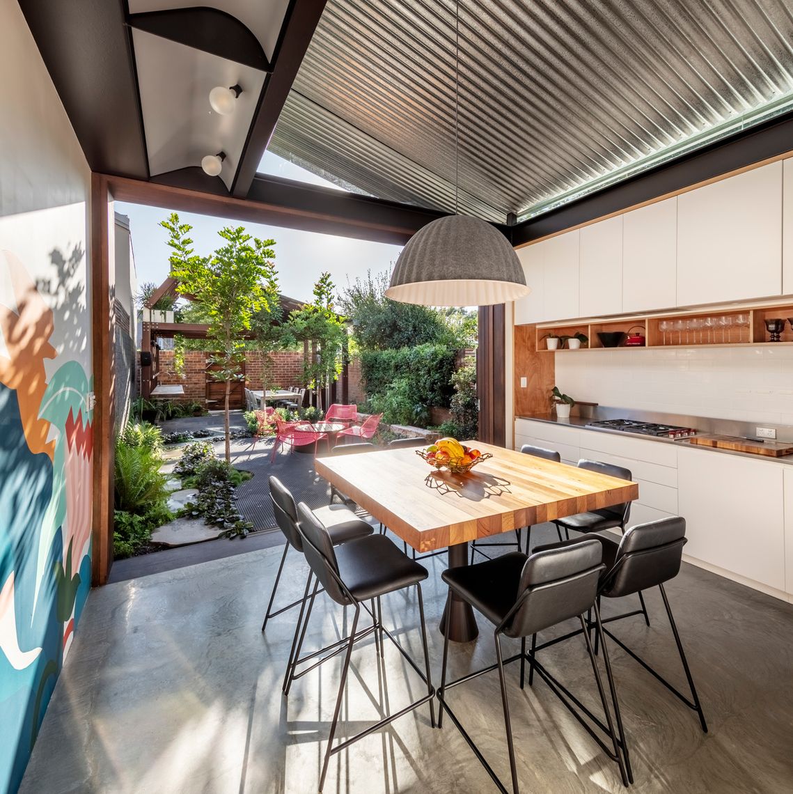 The Secret to Ensuring Light and Breezes for this Long Narrow Home...