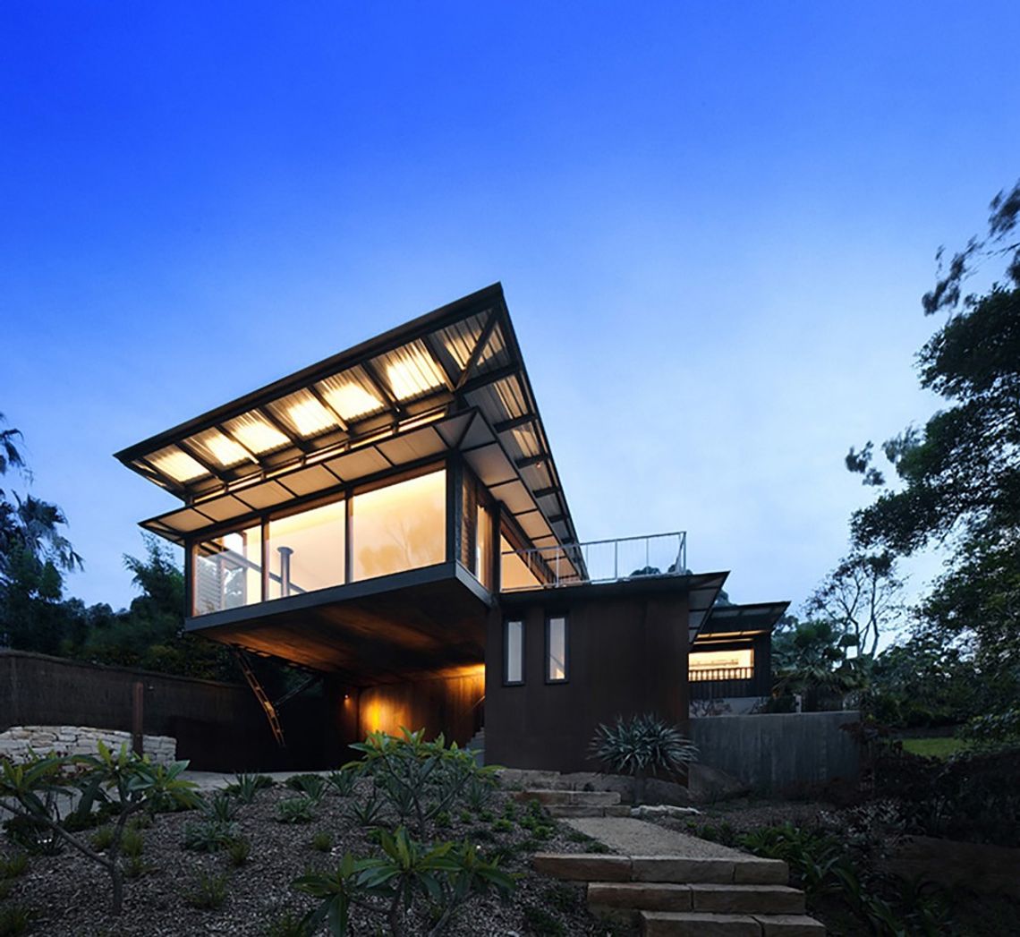 Pacific House Uses Burnt Timber and Rusting Steel to Dramatic Effect