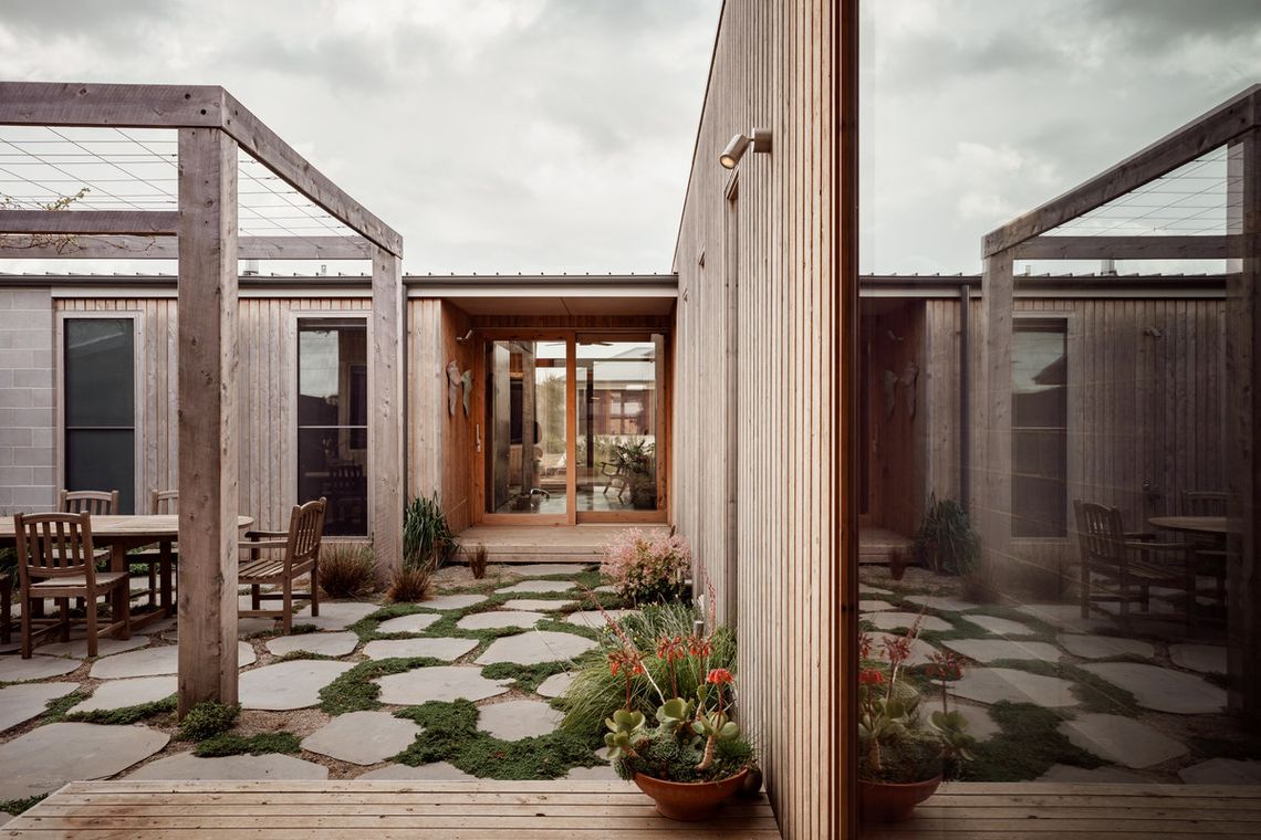 Courtyard design creates a sunny, yet protected, coastal home