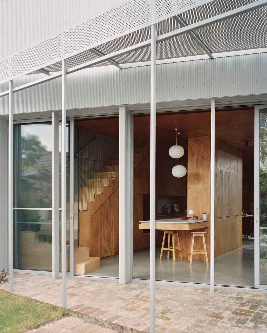 This terrace house renovation creates a lush outlook from every room