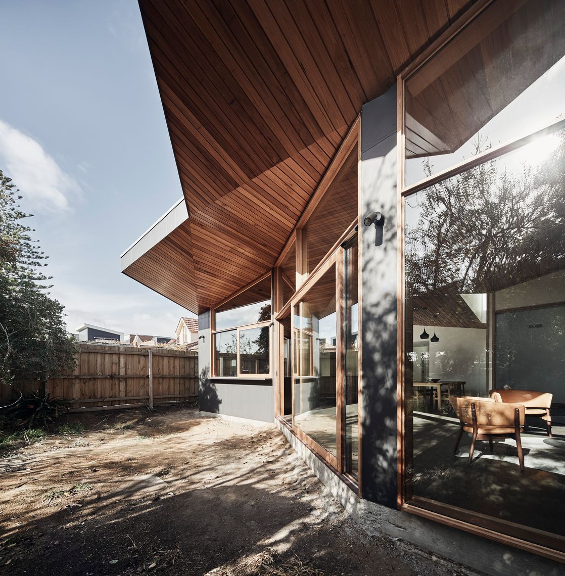 Dramatic Timber Ceiling Soars Over This New Addition