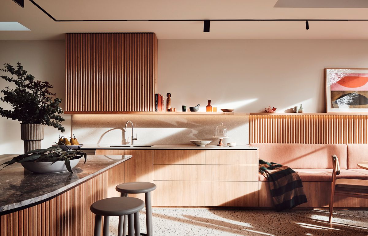 An intricate roofline, folded like origami, grabs light and views