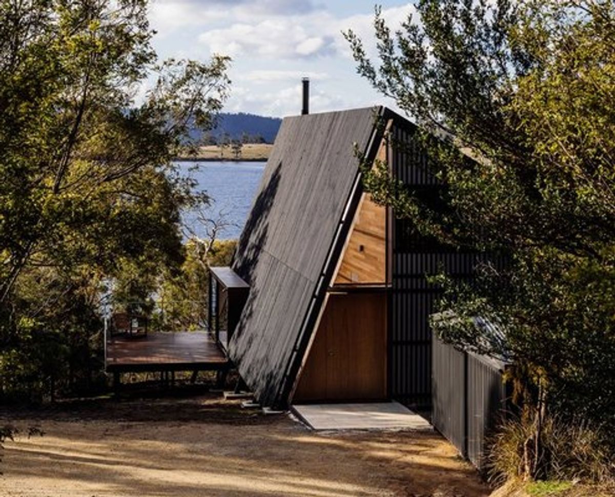 New Spaces Draped Around an Original Cedar-lined Shack Like a Tent