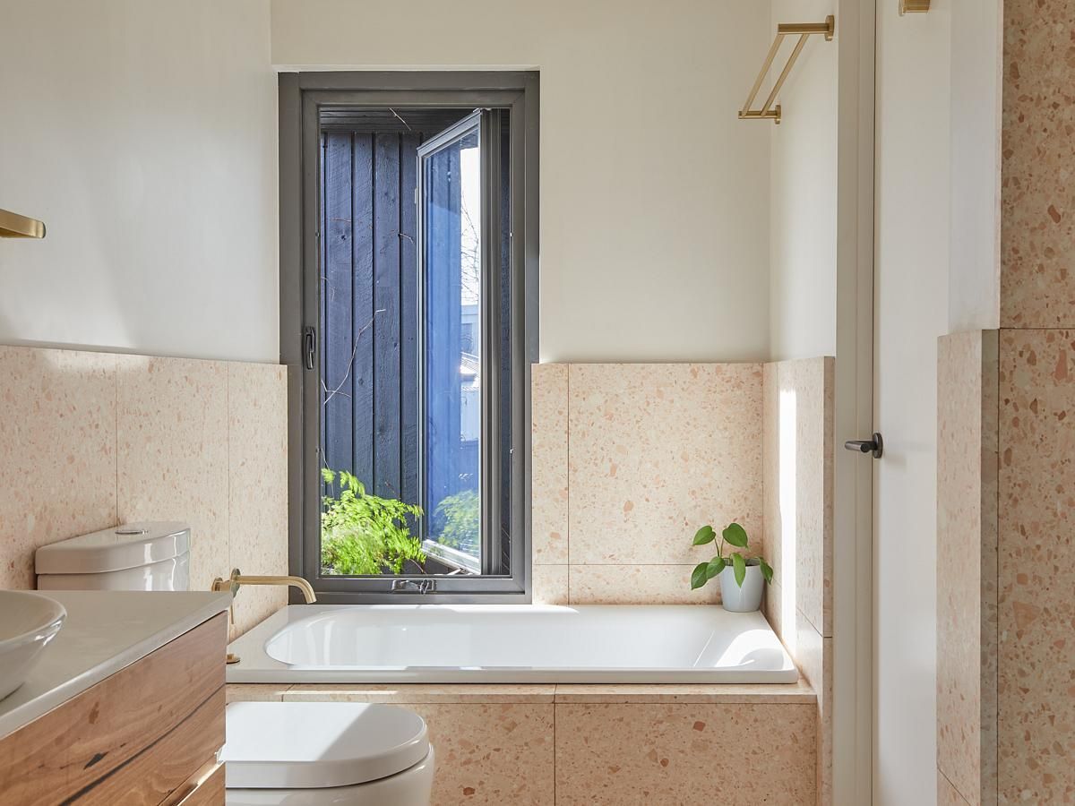 Innovative compact family home design fits in the backyard!