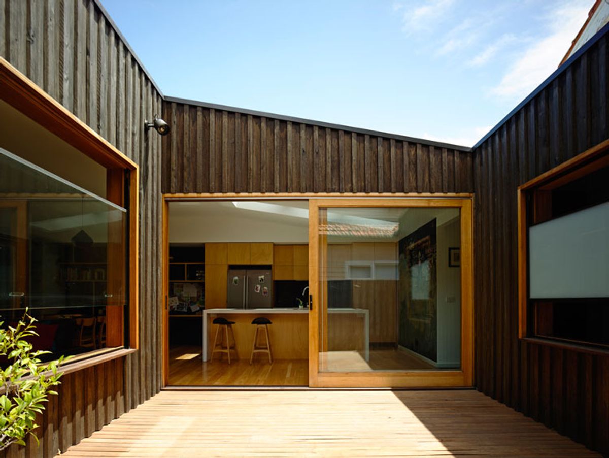 Batten and Board House: A Simple 'Box' Transforms a Weatherboard