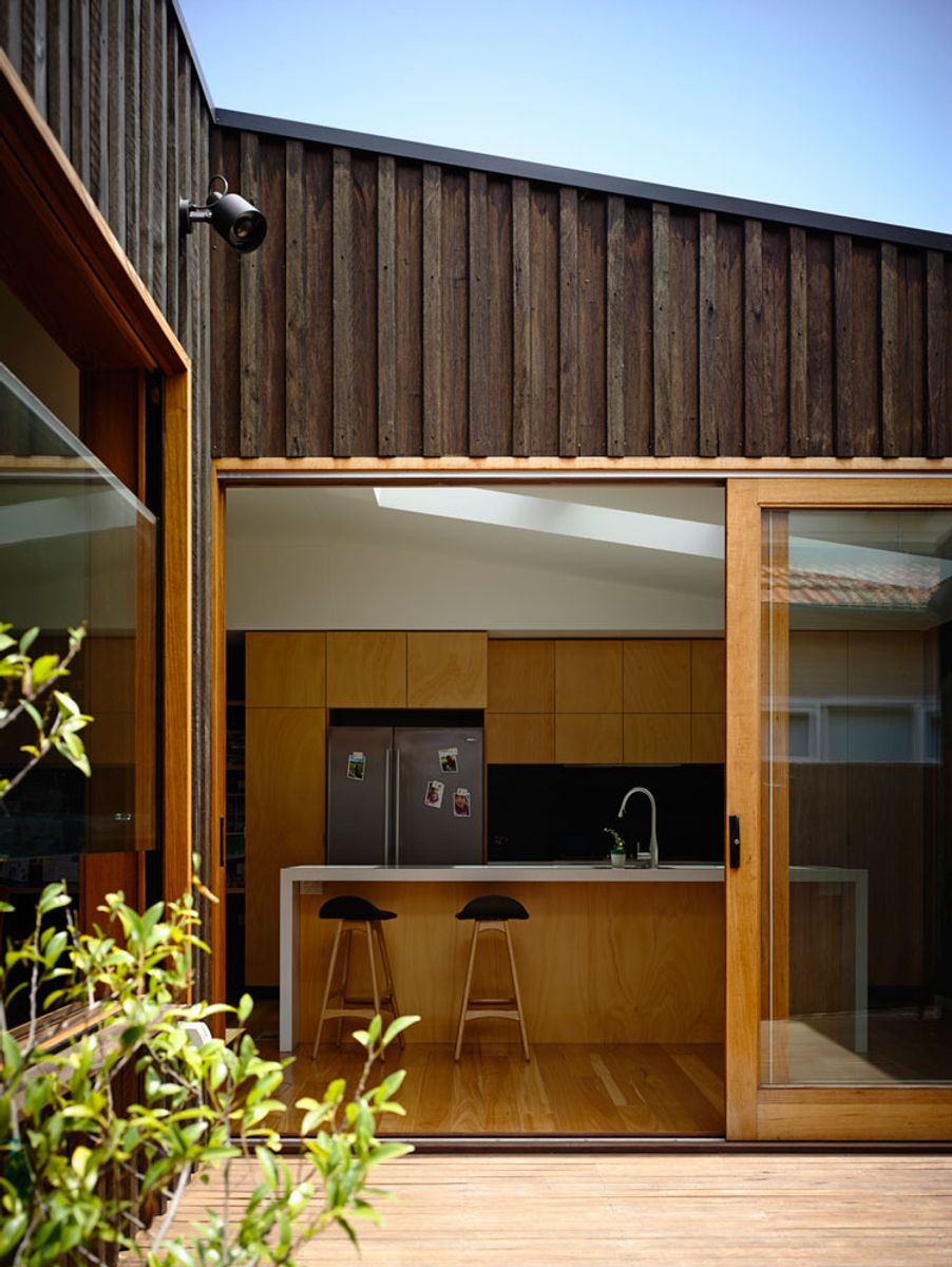 Batten and Board House: A Simple 'Box' Transforms a Weatherboard