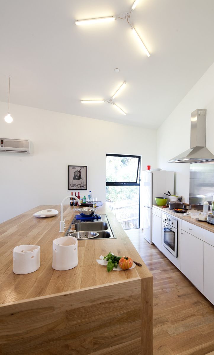 A Single-Space Living Area Helps this Compact Home to Feel Spacious