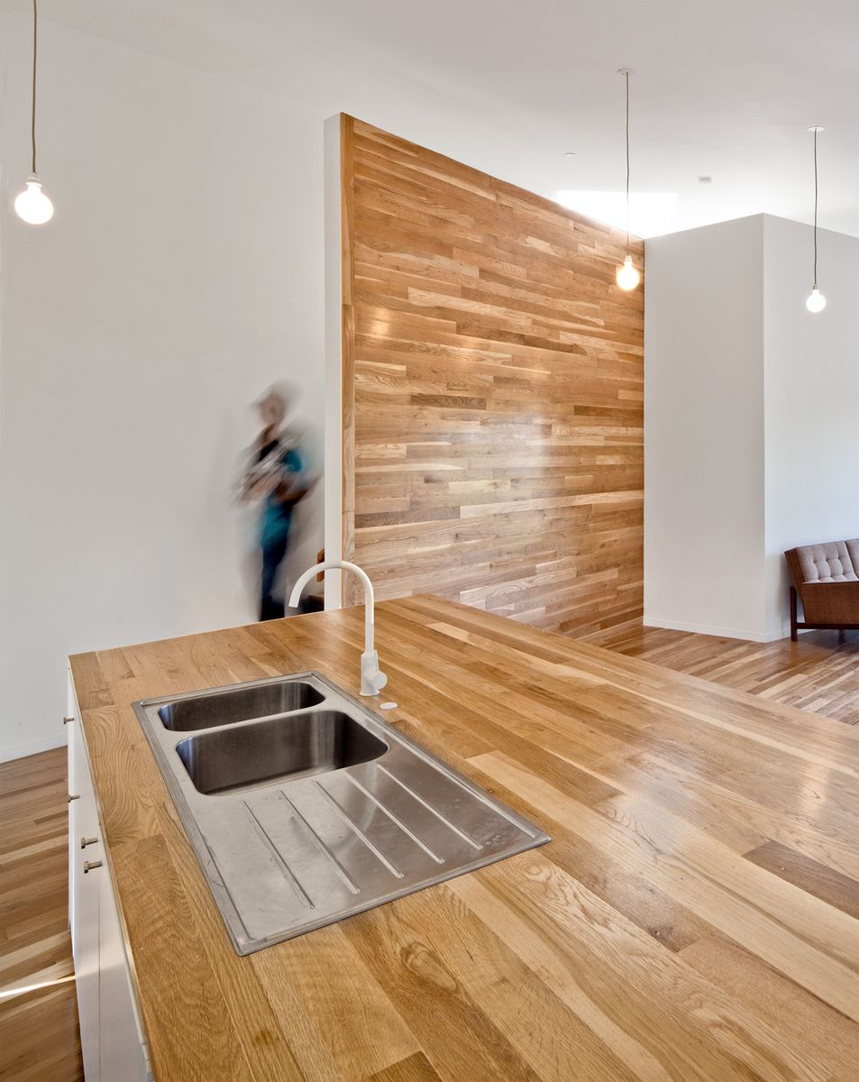 A Single-Space Living Area Helps this Compact Home to Feel Spacious