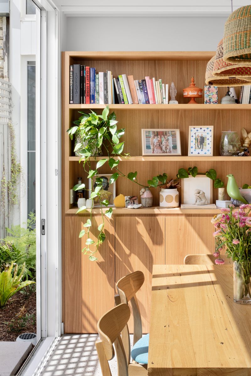 This addition feels spacious in spite of a long, narrow block...