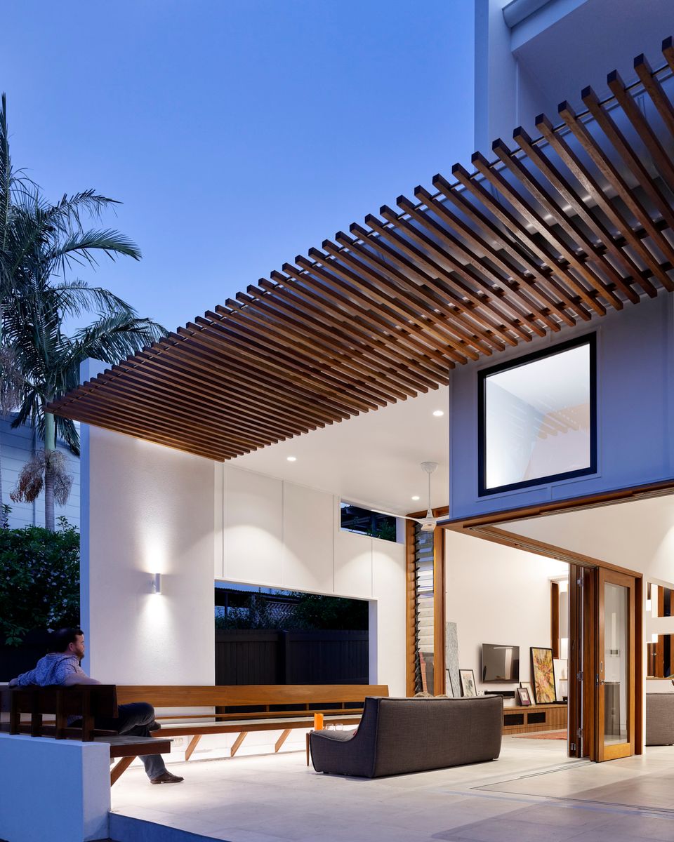 This modern Queenslander has a surprise behind its unassuming facade