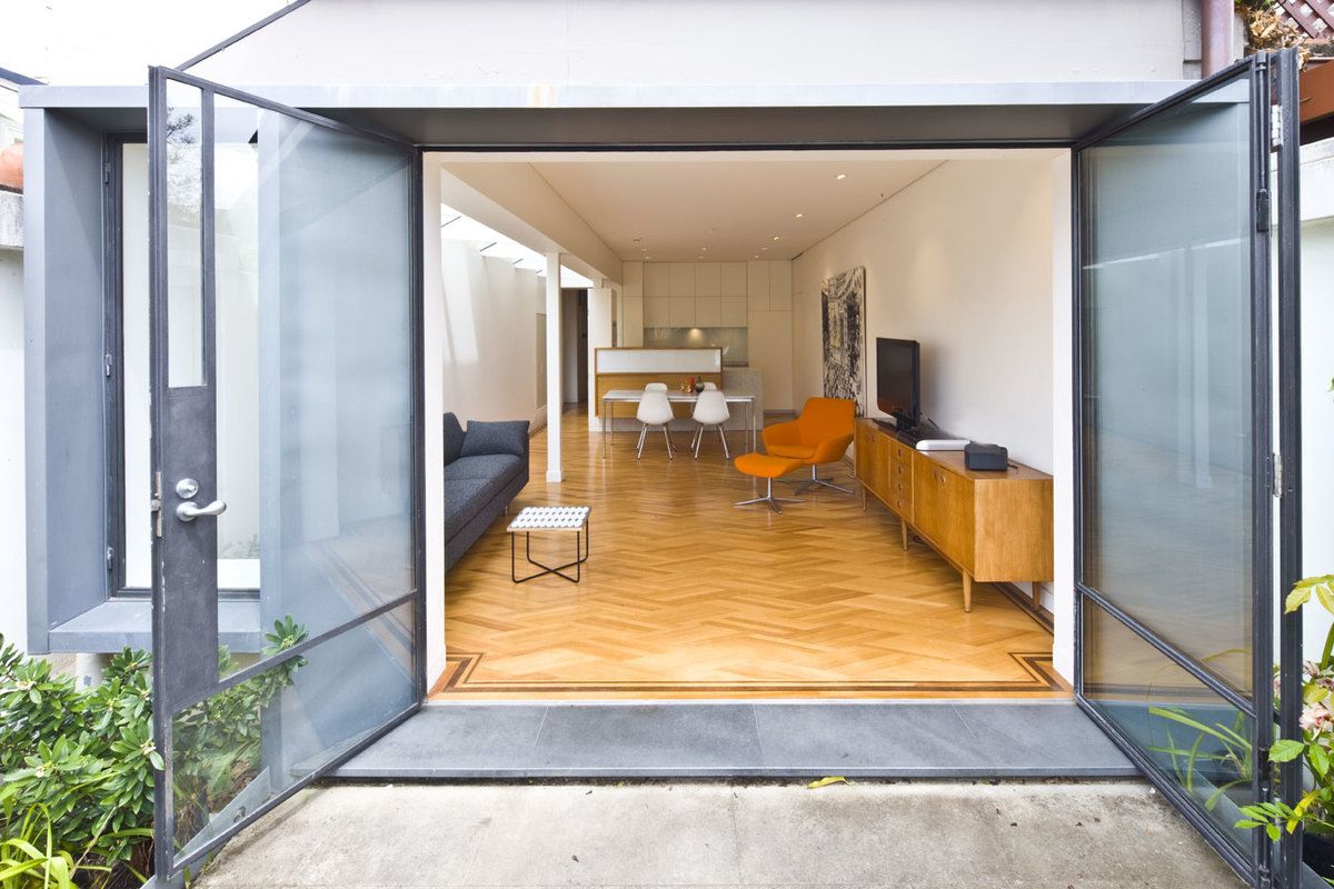 An Escher-inspired Stair Makes Living in 4 Storey Terrace More Fun