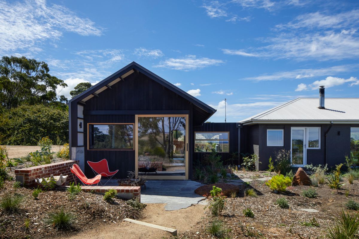 Charred Timber Creates a New BAL-12.5 Wing for This Country Home