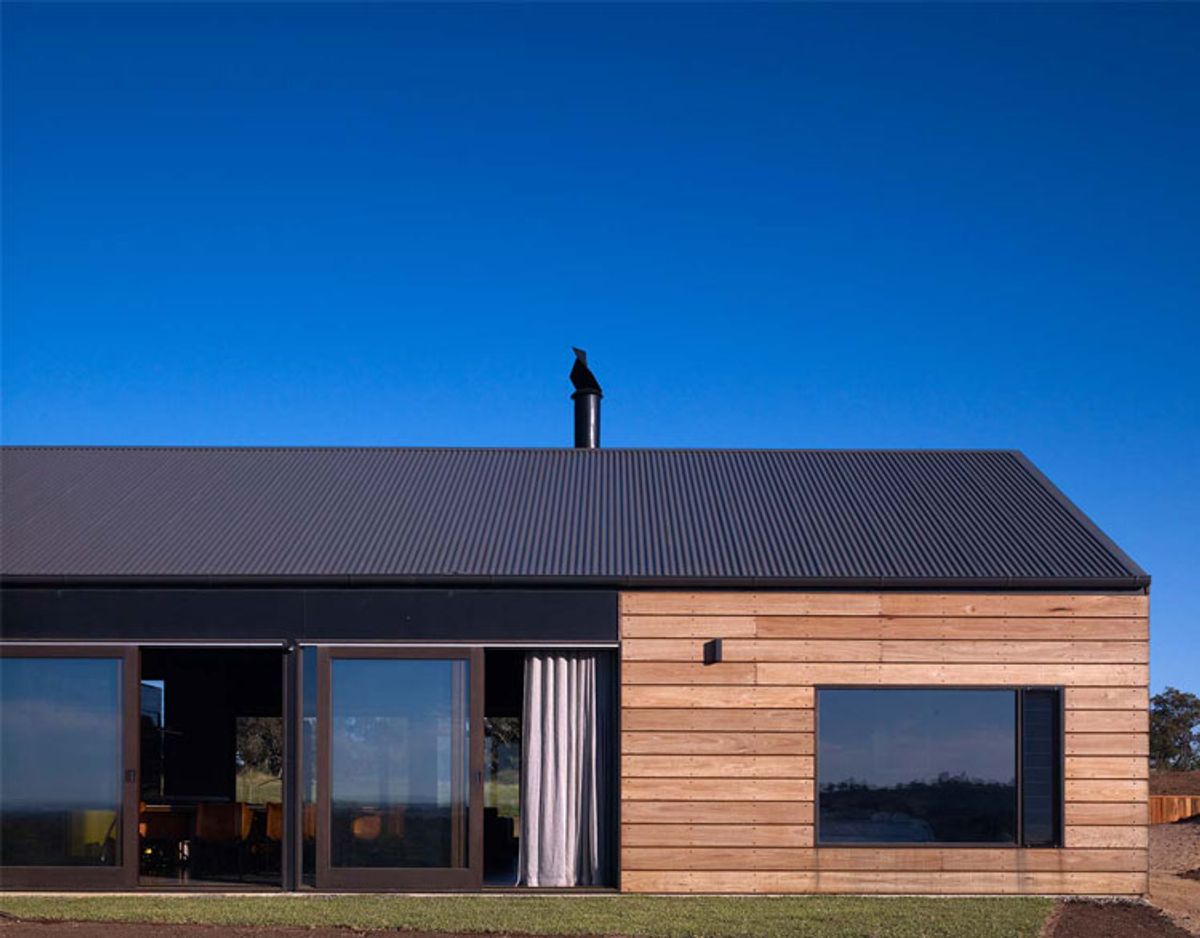Hill Plain House: Agricultural Chic Outside; Moody Bachelor Pad Inside