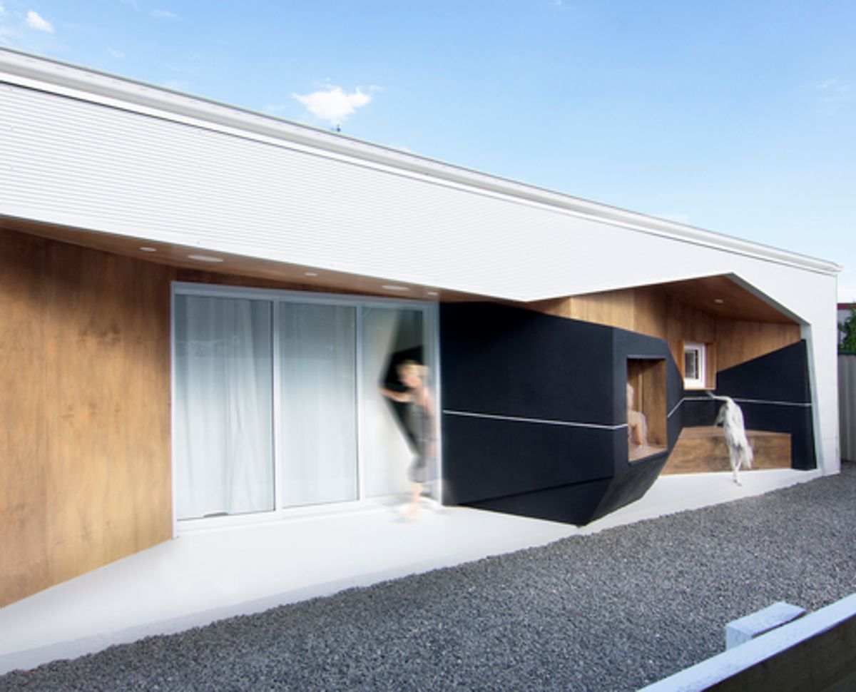 There's a Fully Equipped House Tucked Into This Suburban Backyard