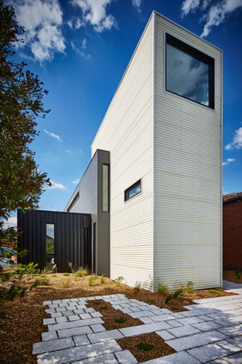 Modular Tower House's Lofty Design Makes a Statement in Sleepy Suburb