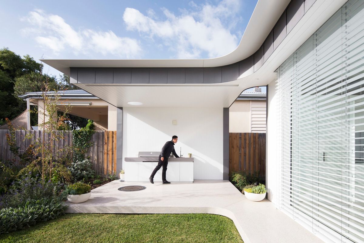 Outside In House: This Modern Extension Doesn't Steal the Limelight