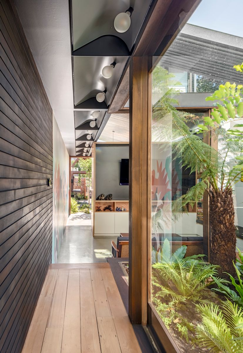 The Secret to Ensuring Light and Breezes for this Long Narrow Home...