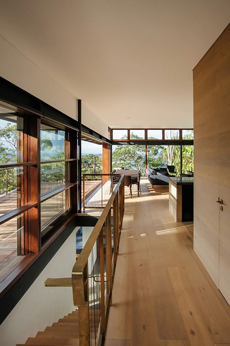 Pacific House Uses Burnt Timber and Rusting Steel to Dramatic Effect