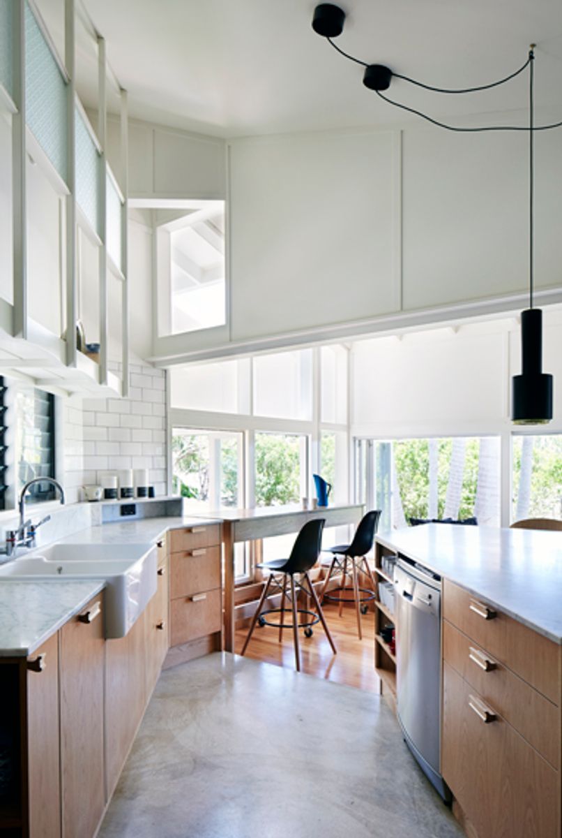 A New Triangular Kitchen Extension Creates New Informal Living Area