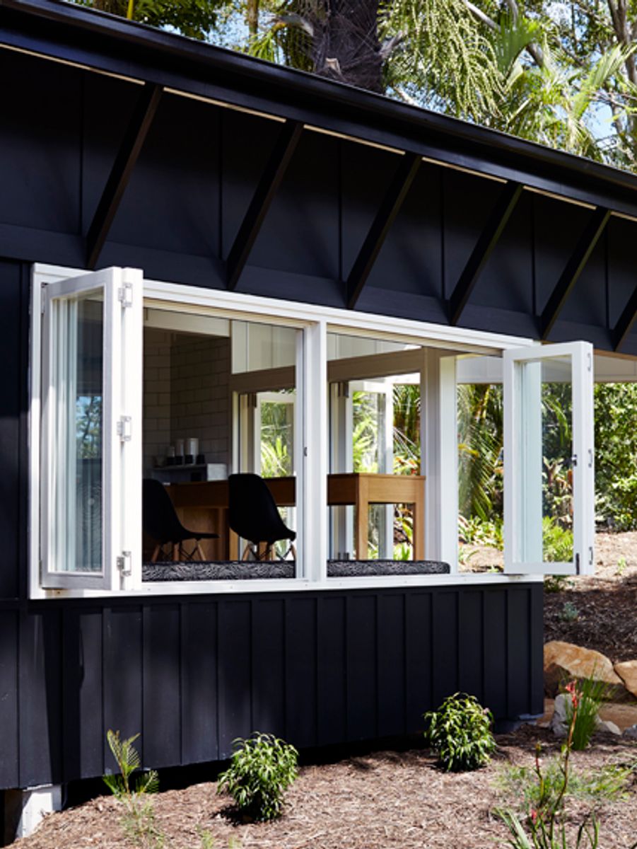 A New Triangular Kitchen Extension Creates New Informal Living Area