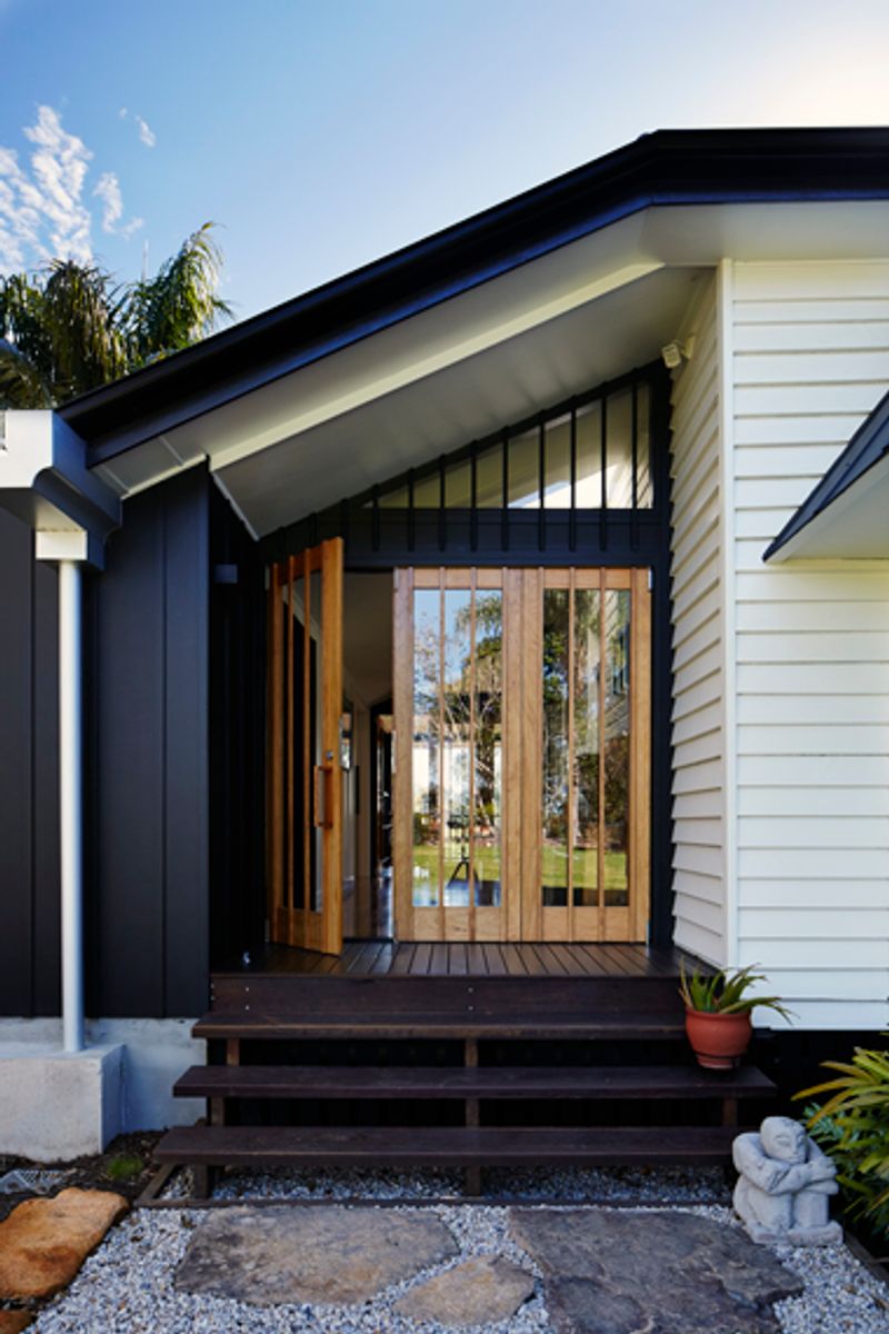 A New Triangular Kitchen Extension Creates New Informal Living Area