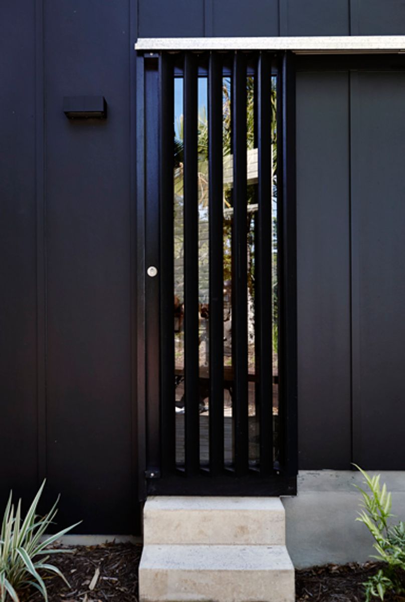 A New Triangular Kitchen Extension Creates New Informal Living Area