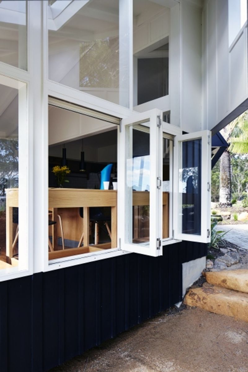 A New Triangular Kitchen Extension Creates New Informal Living Area