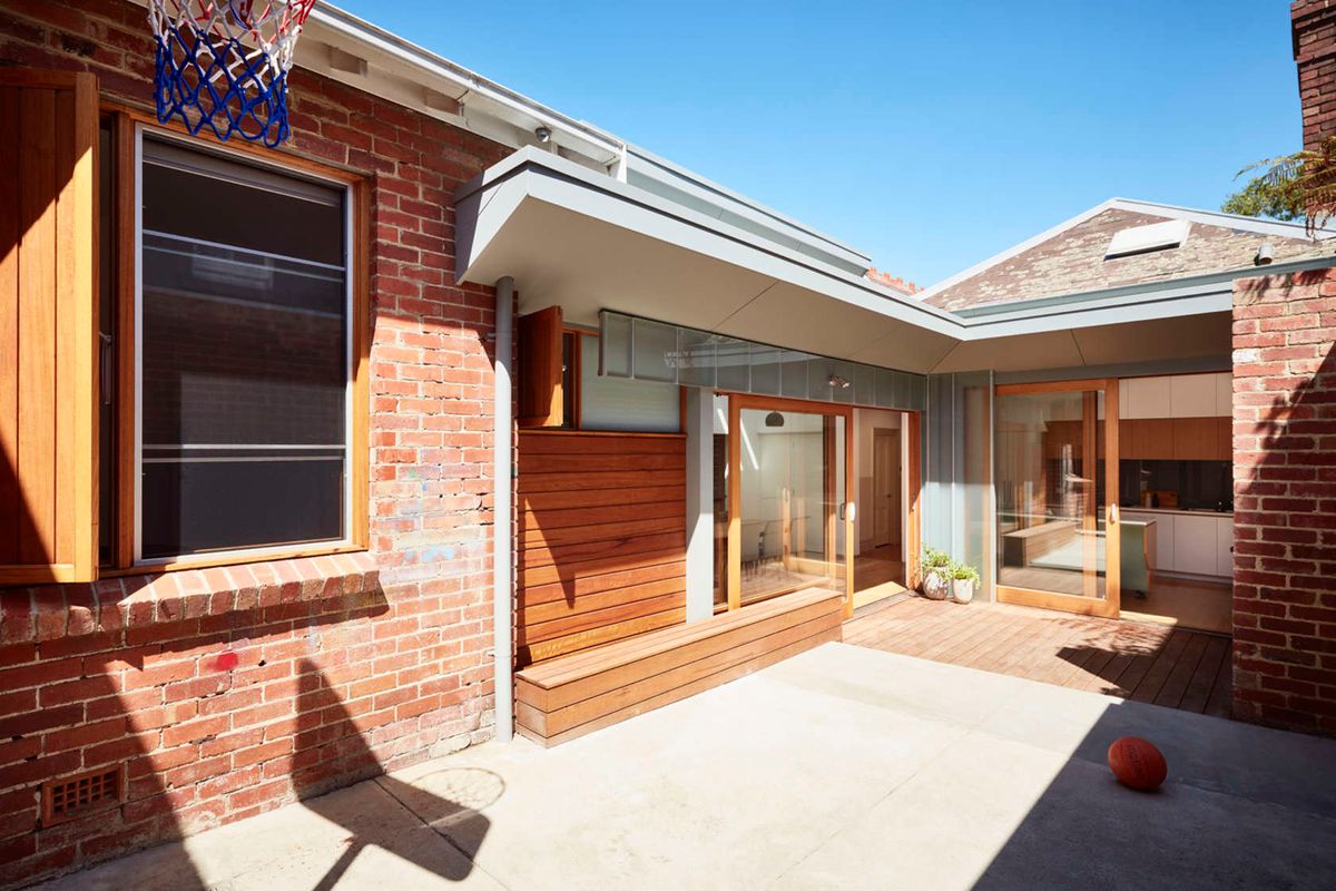 Glazed Atrium Dining Room Links and Lights This Heritage Home