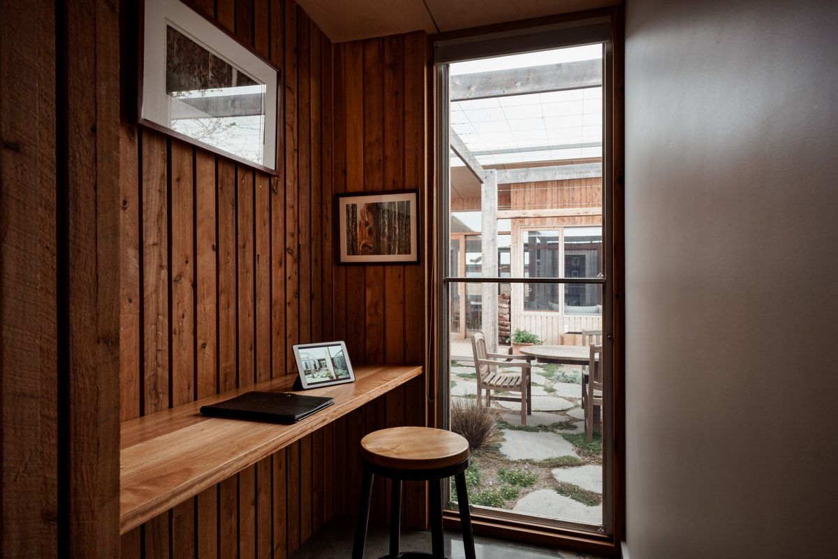 Courtyard design creates a sunny, yet protected, coastal home