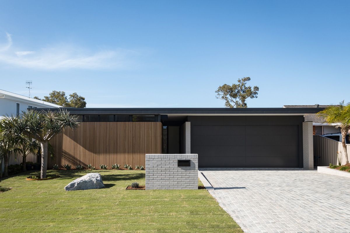 1970s-era Red Brick Home Completely Transformed by Modern Renovation