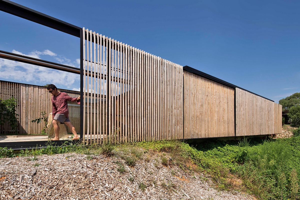 Sawmill House Rethinks Waste Materials to Create Raw, Rustic Beauty