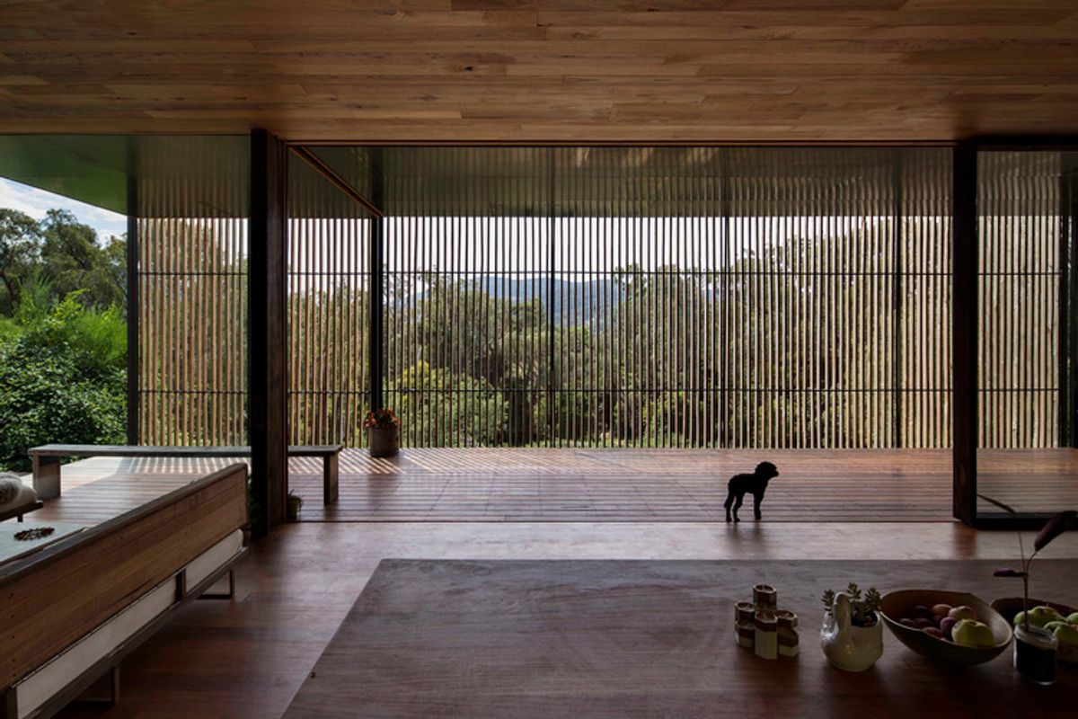 Sawmill House Rethinks Waste Materials to Create Raw, Rustic Beauty
