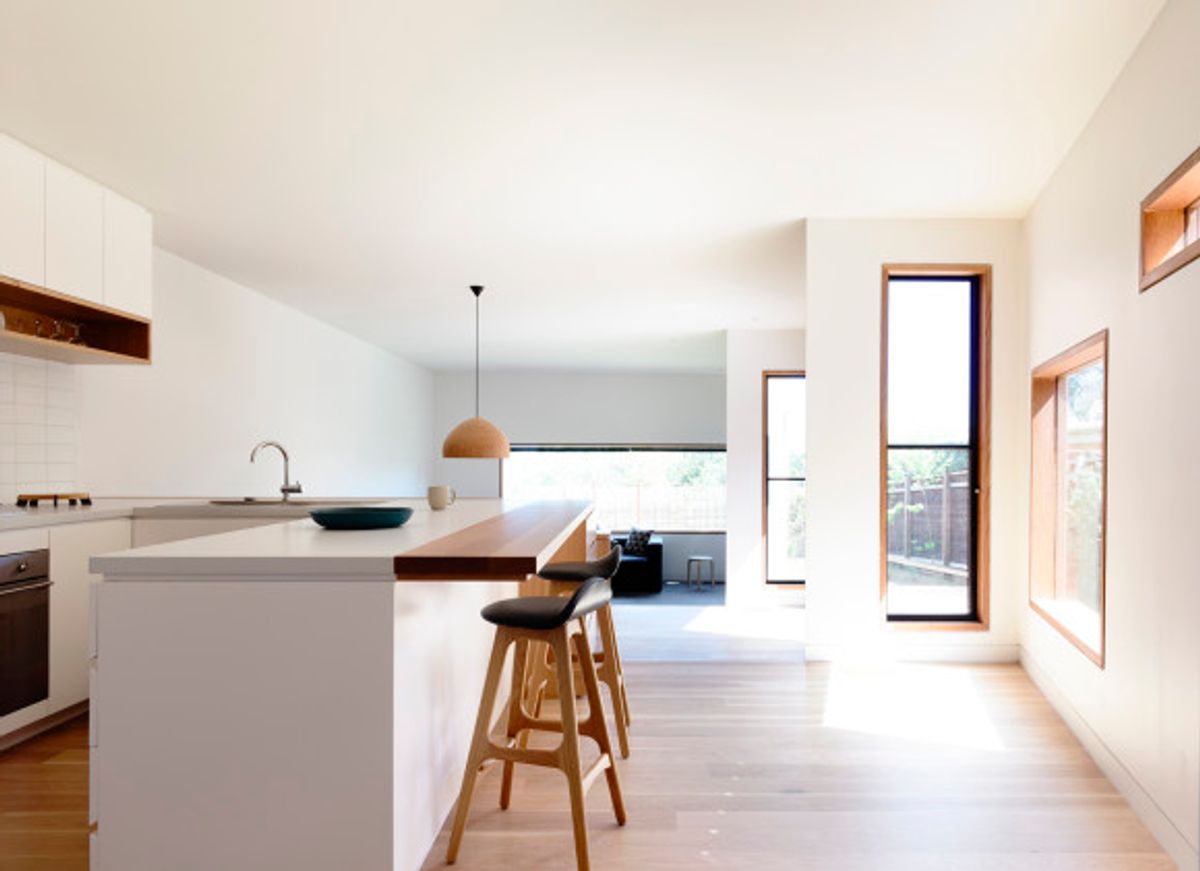 Stepped House Deals with a Sloping South-Facing Site with Style