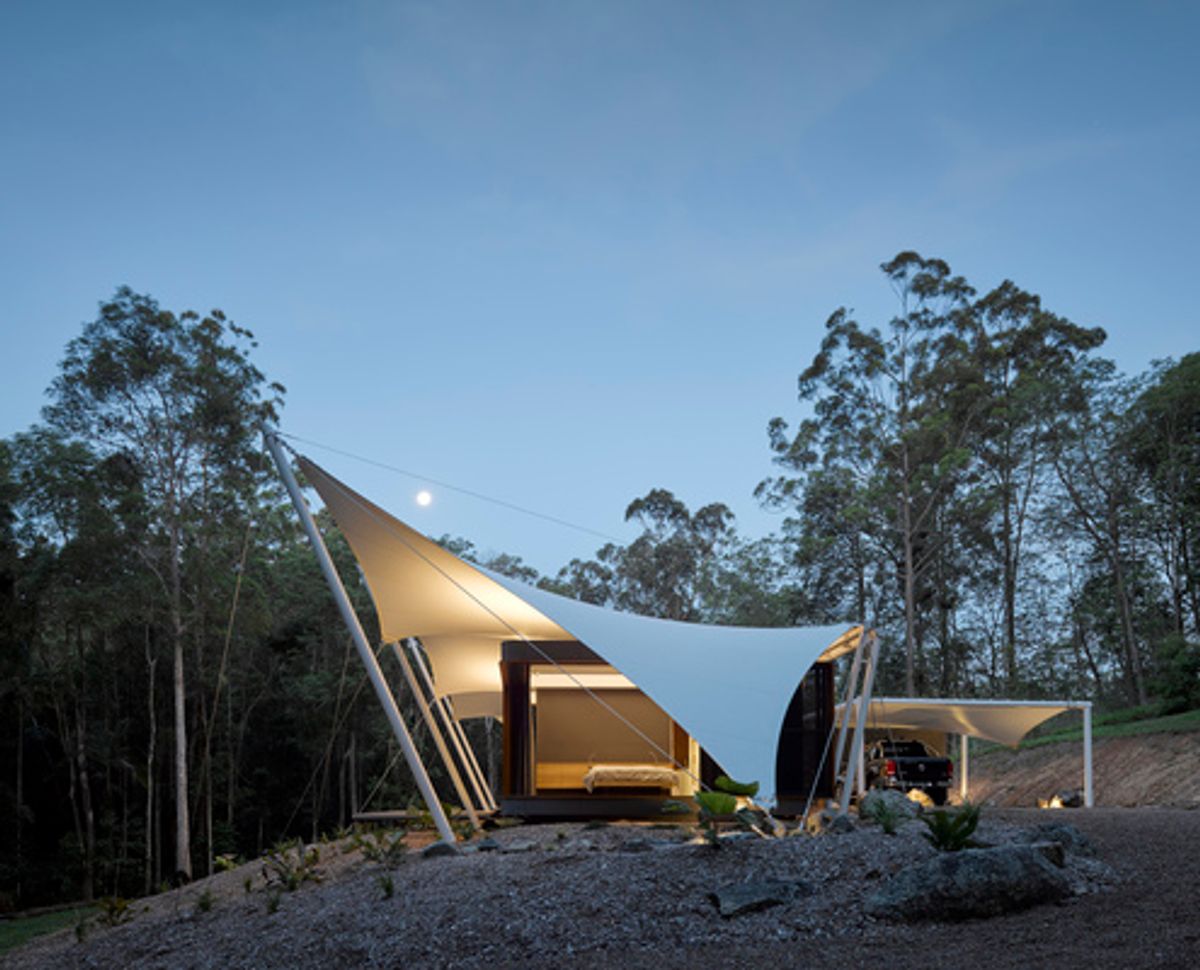 A Unique Family Home Covered Entirely By a Tent Structure