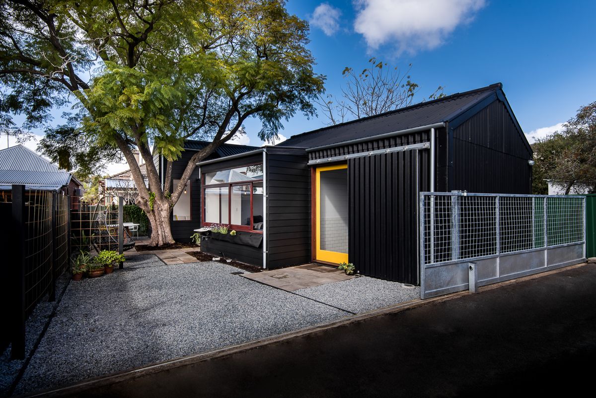 Industrial Home/Studio Compliments Illustrator's Punchy Aesthetic