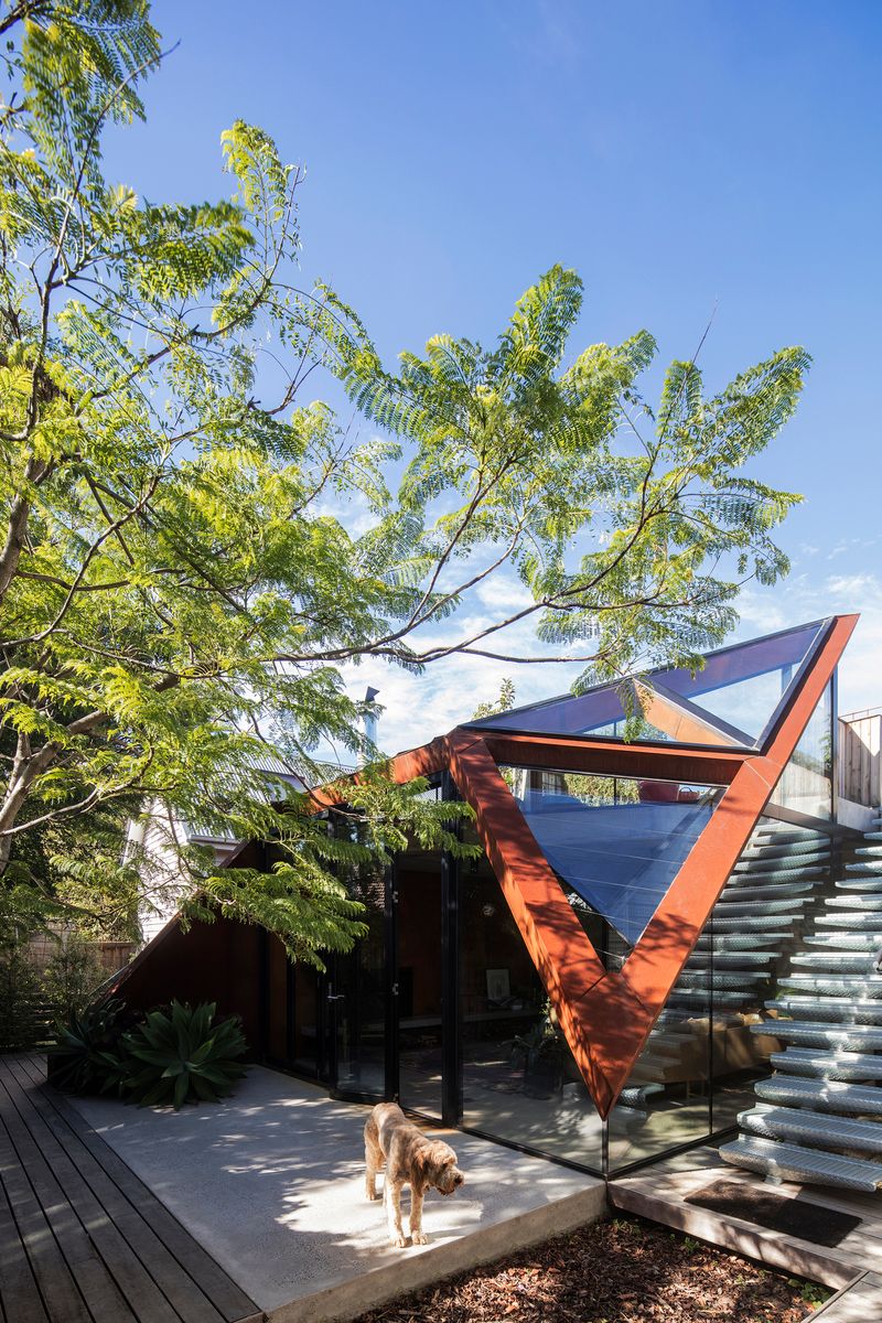 Glazed Roof Floats Like a Leaf Capturing Views of Trees and Sky