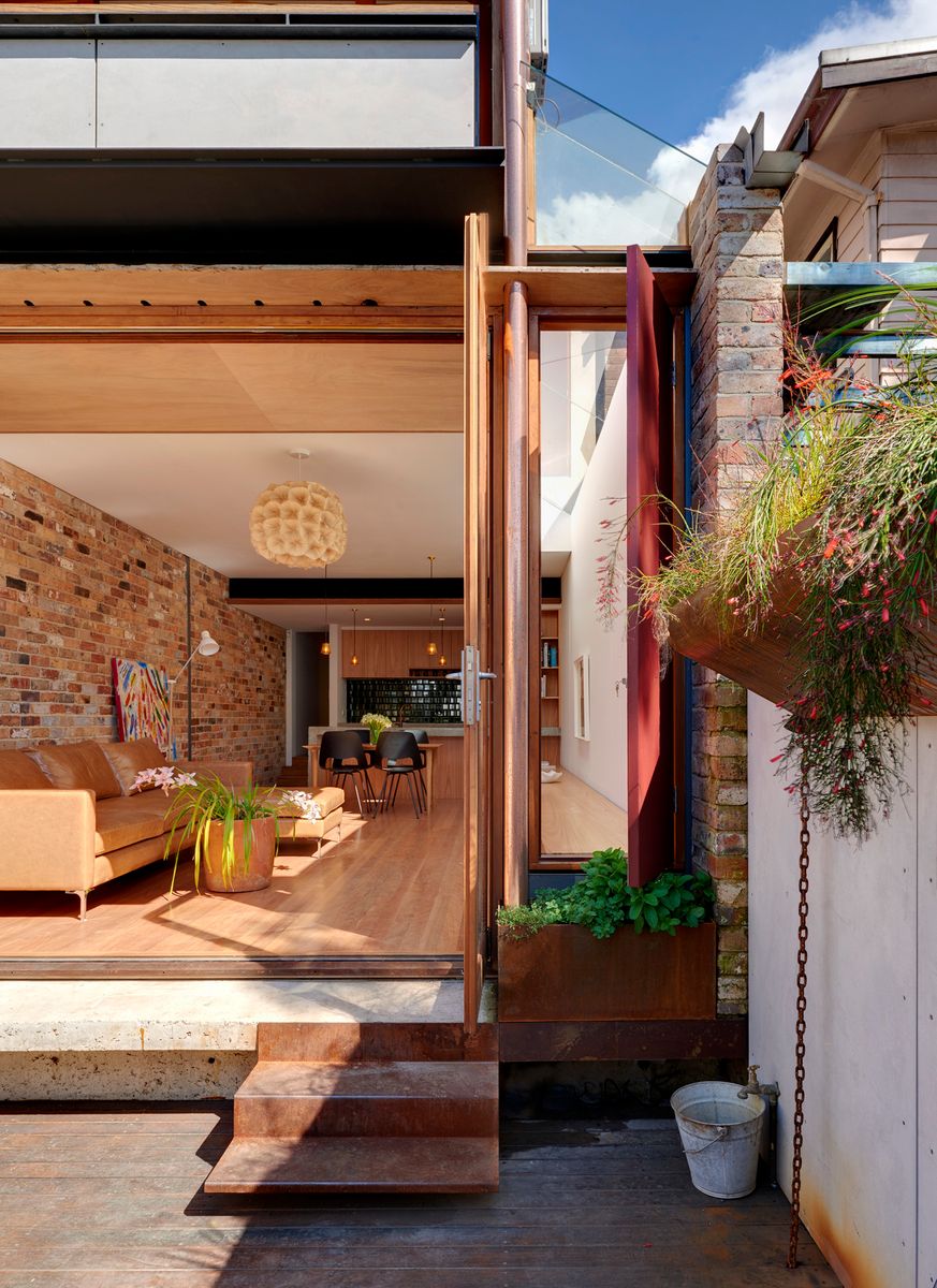 The Renovation of This Terrace Reuses Existing Materials in New Ways