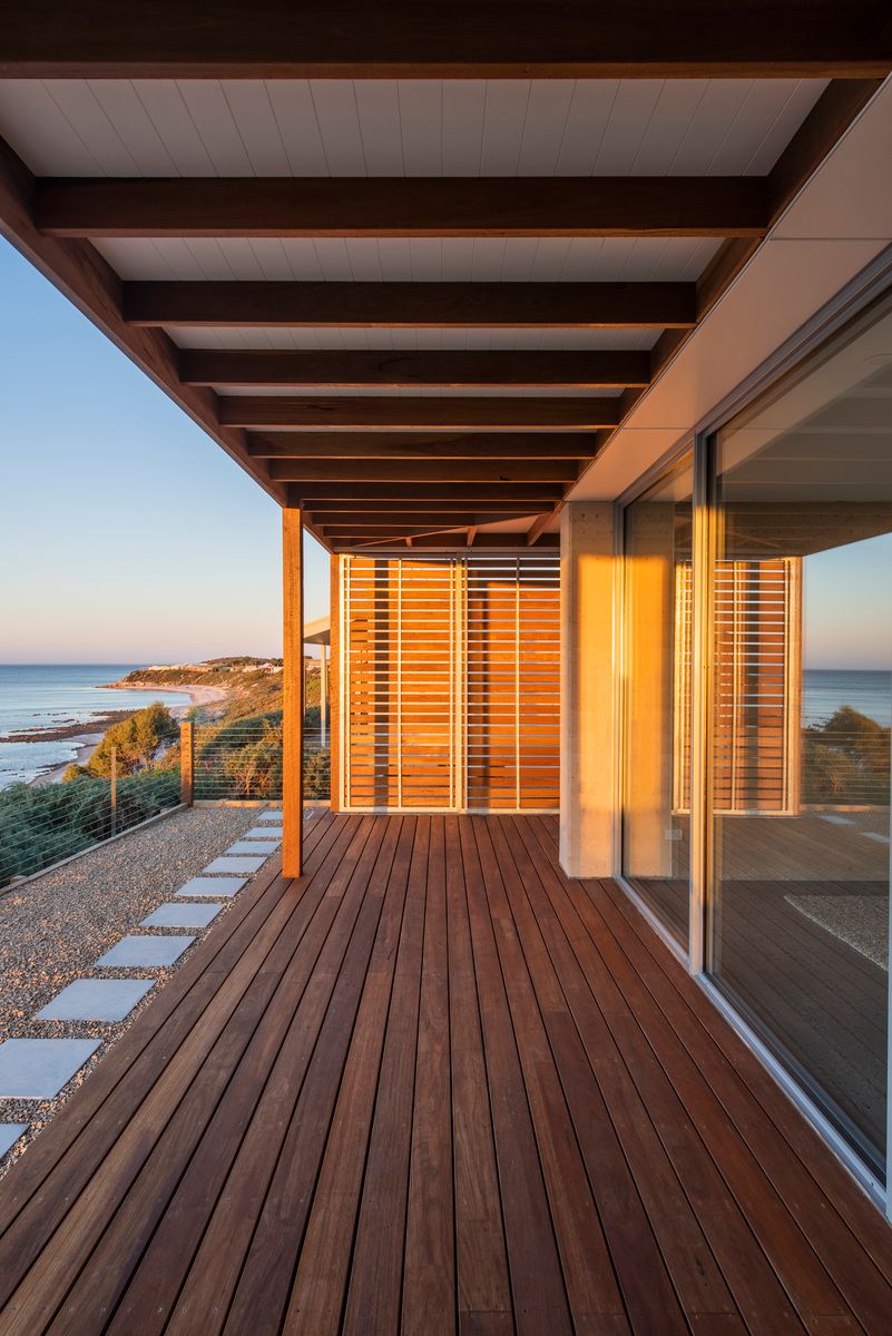 Beach House Nestles Into Its Spectacular Limestone Cliff Setting