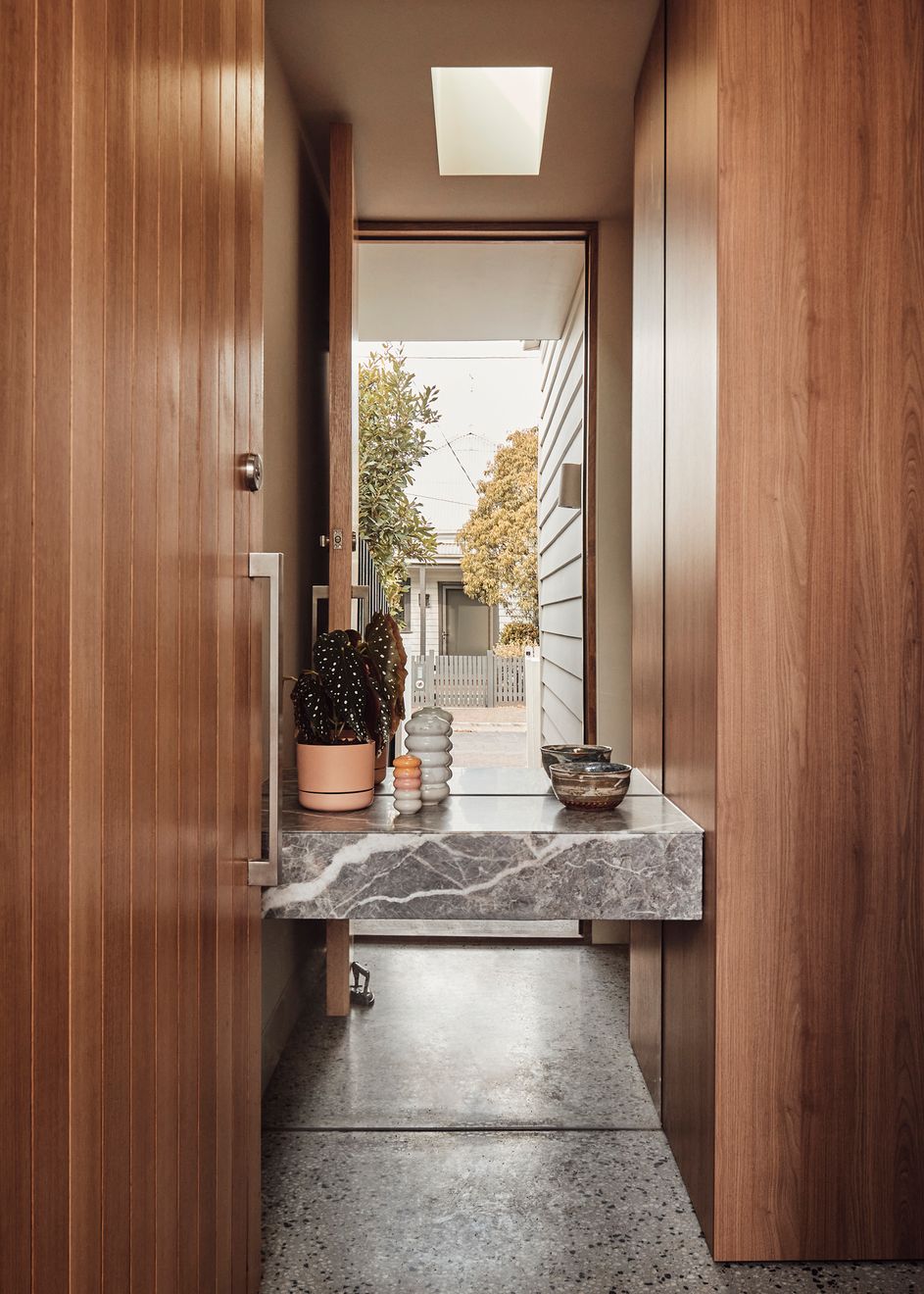 An intricate roofline, folded like origami, grabs light and views