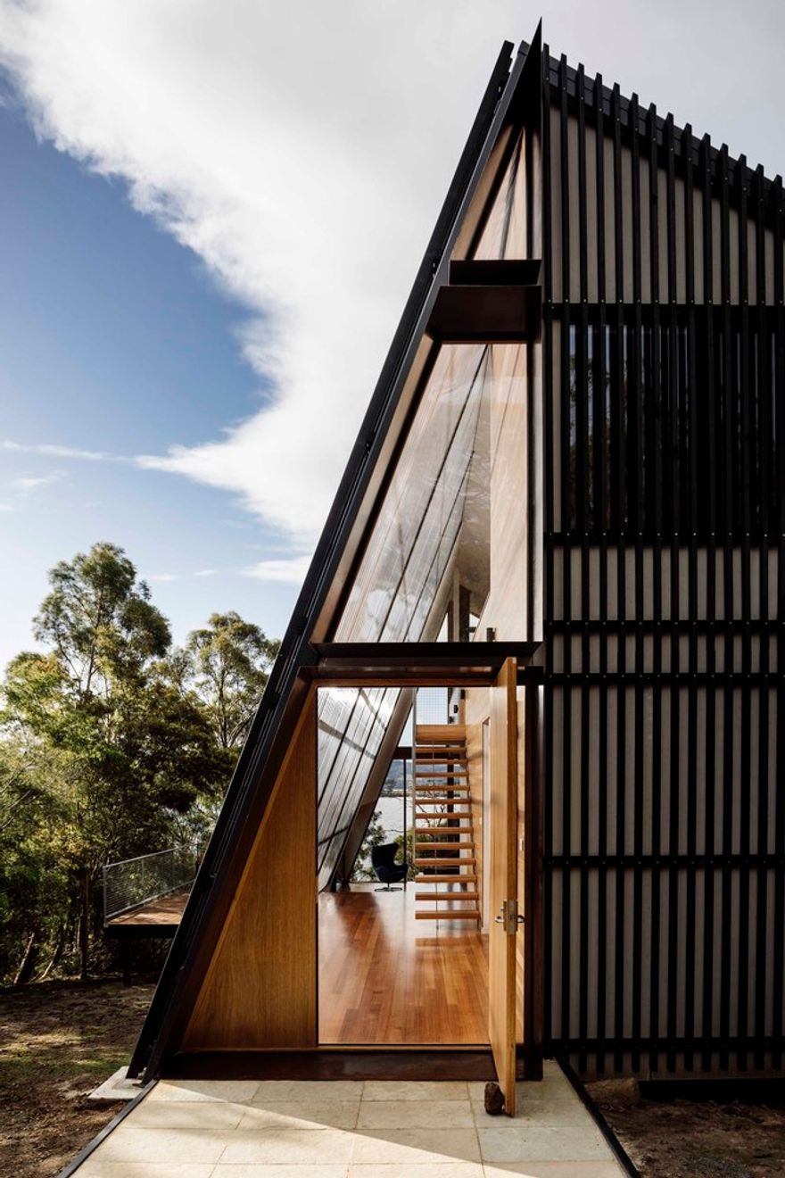 New Spaces Draped Around an Original Cedar-lined Shack Like a Tent