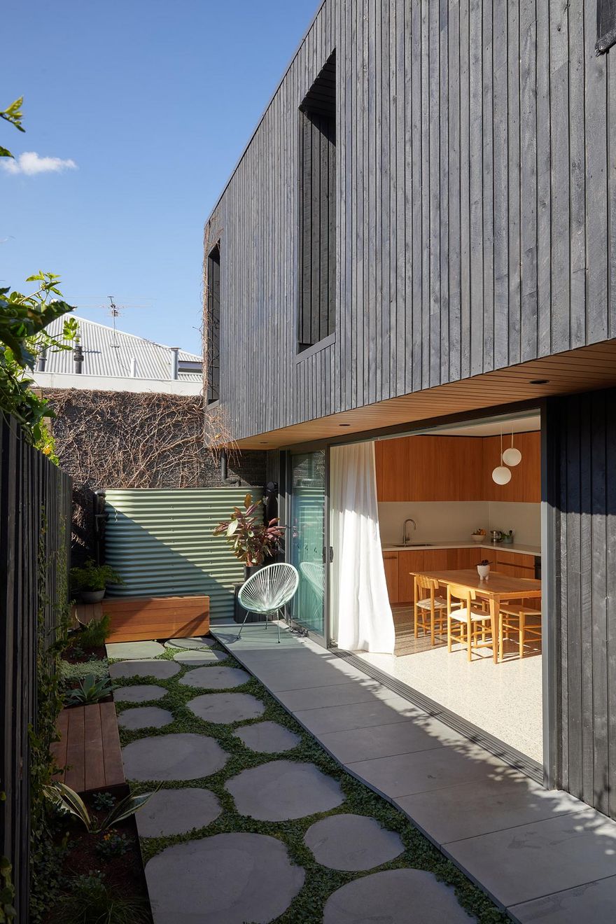 Innovative compact family home design fits in the backyard!