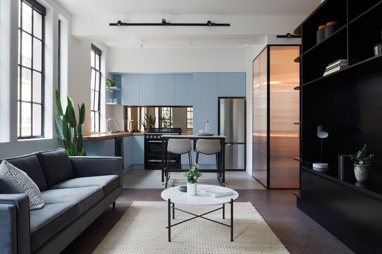 This Fun-Filled Apartment Renovation Has a Rock Climbing Wall