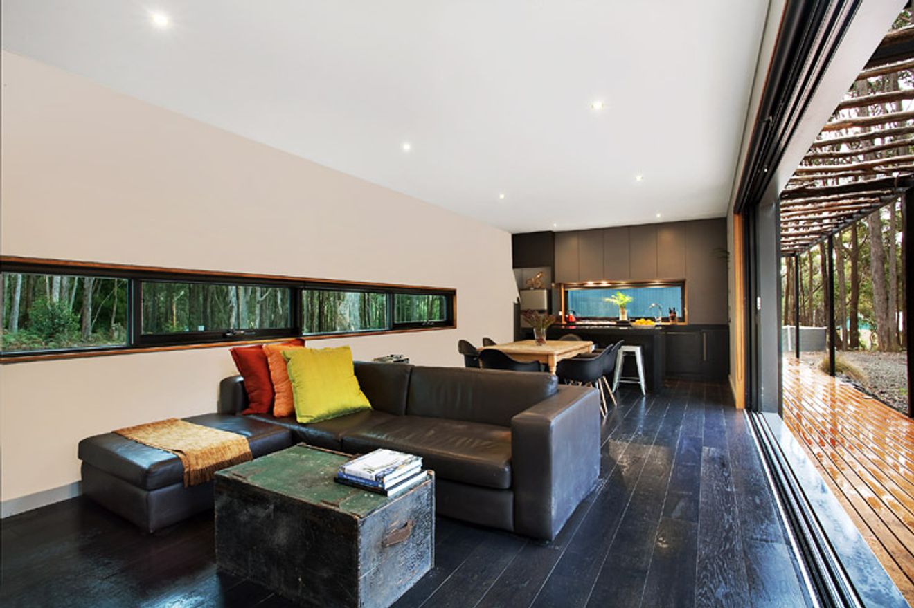 A Perfectly Proportioned Prefab Cabin Secluded in a Forest Clearing