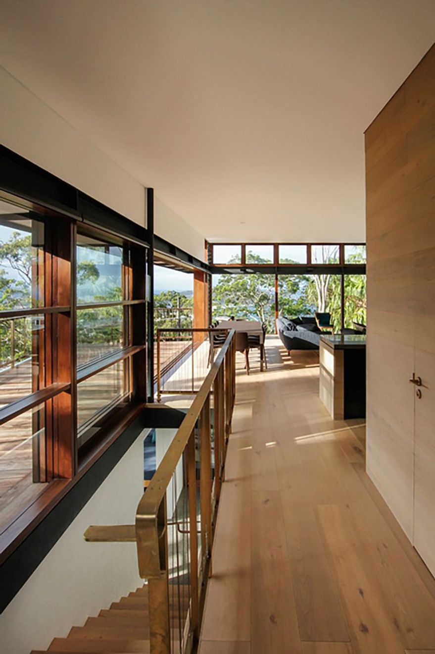 Pacific House Uses Burnt Timber and Rusting Steel to Dramatic Effect