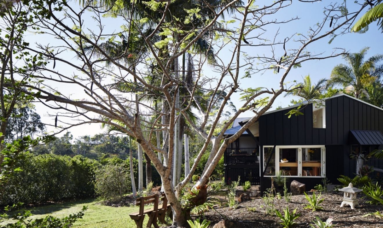 A New Triangular Kitchen Extension Creates New Informal Living Area