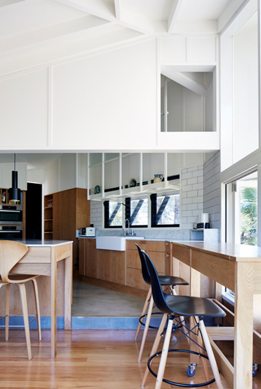 A New Triangular Kitchen Extension Creates New Informal Living Area