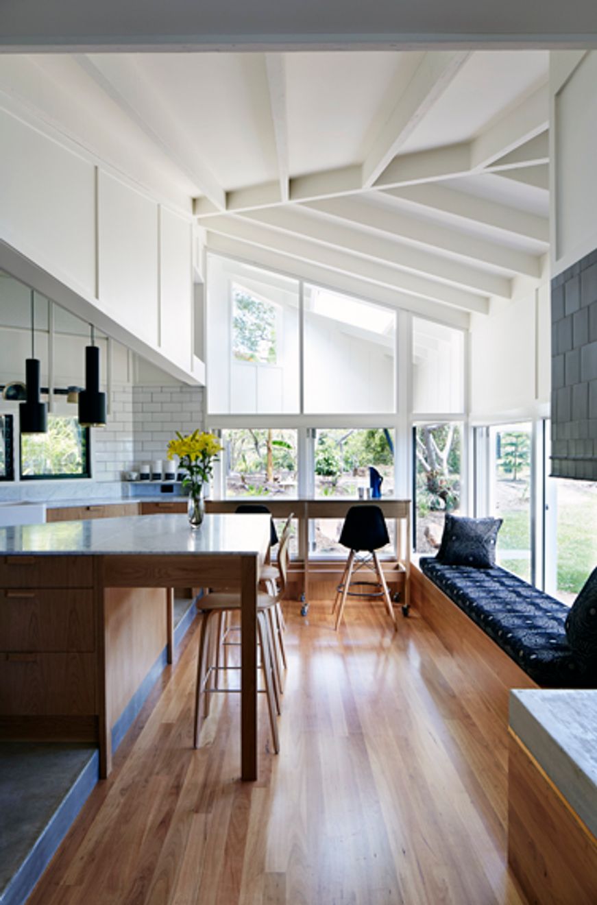 A New Triangular Kitchen Extension Creates New Informal Living Area